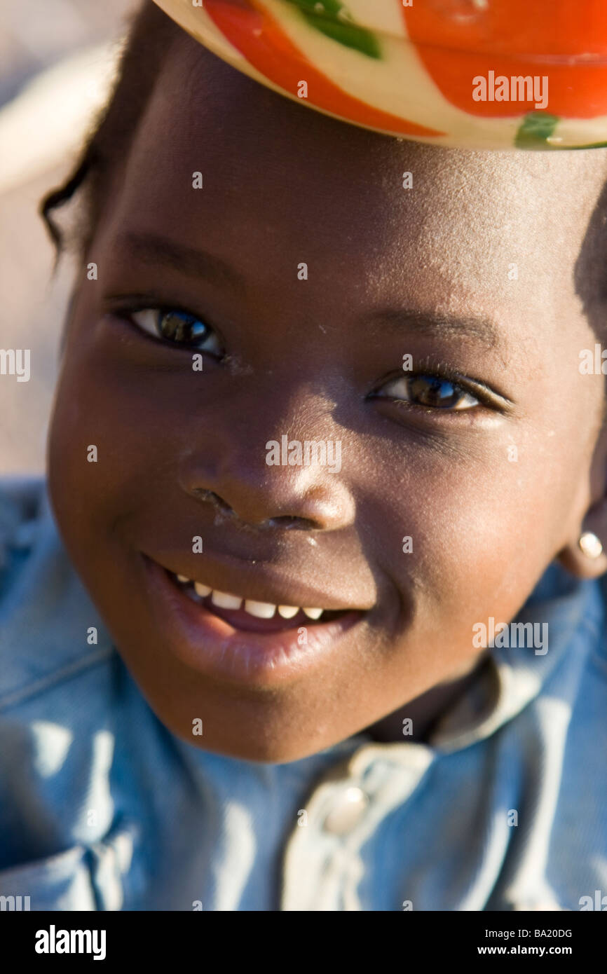 Smiling Malian Girl with a ball in Djenne Mali West Africa Stock Photo ...