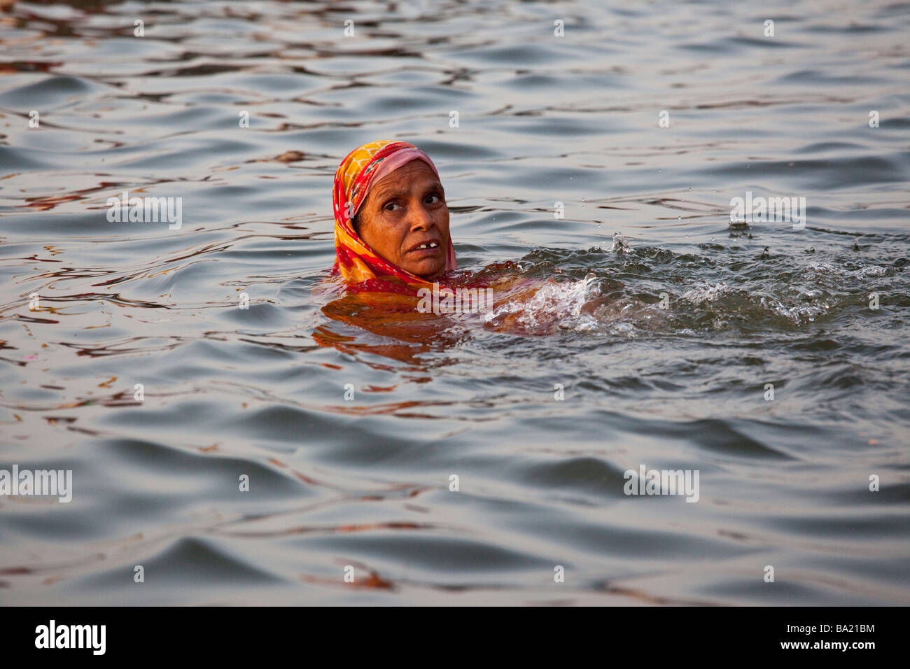 Indian woman bathing in river hi-res stock photography and images - Alamy
