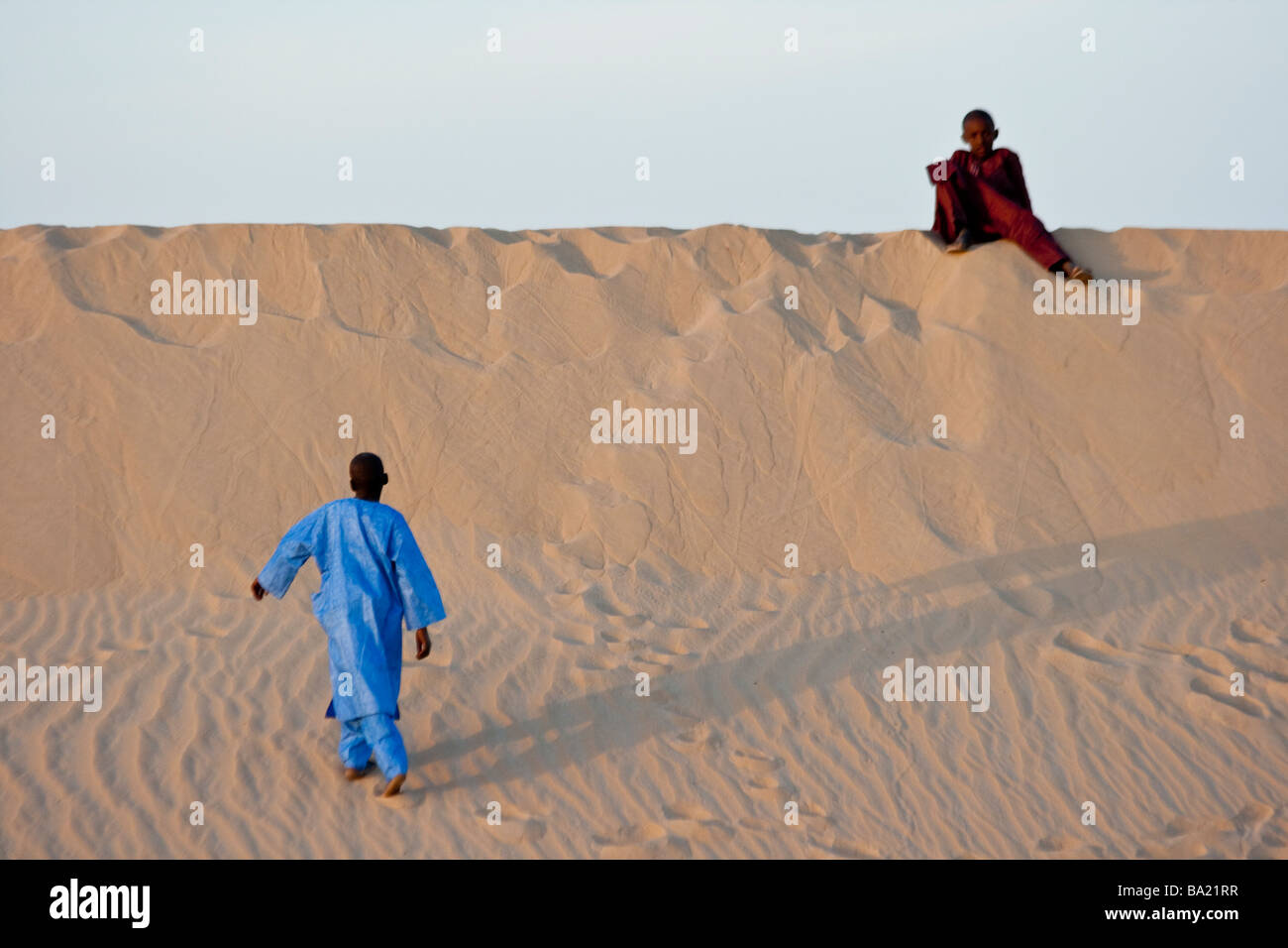 Muslim boys wearing traditional clothing hi-res stock photography and ...