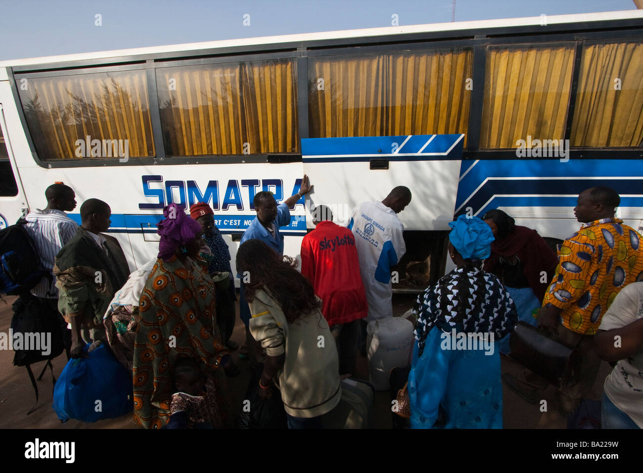 Collecting Luggage from a Somatra Company Bus in Mali West Africa Stock ...