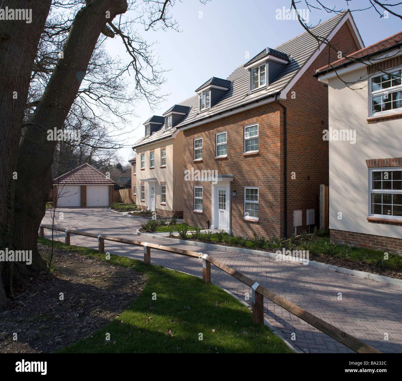 Modern detached house in residential street Sussex South East England ...