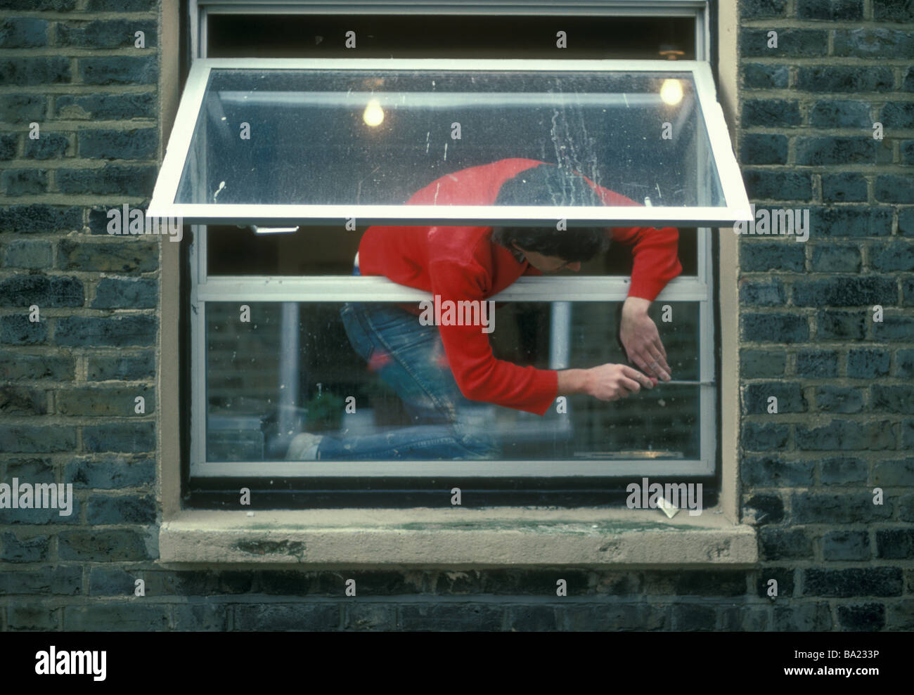 Fixing a window hi-res stock photography and images - Alamy