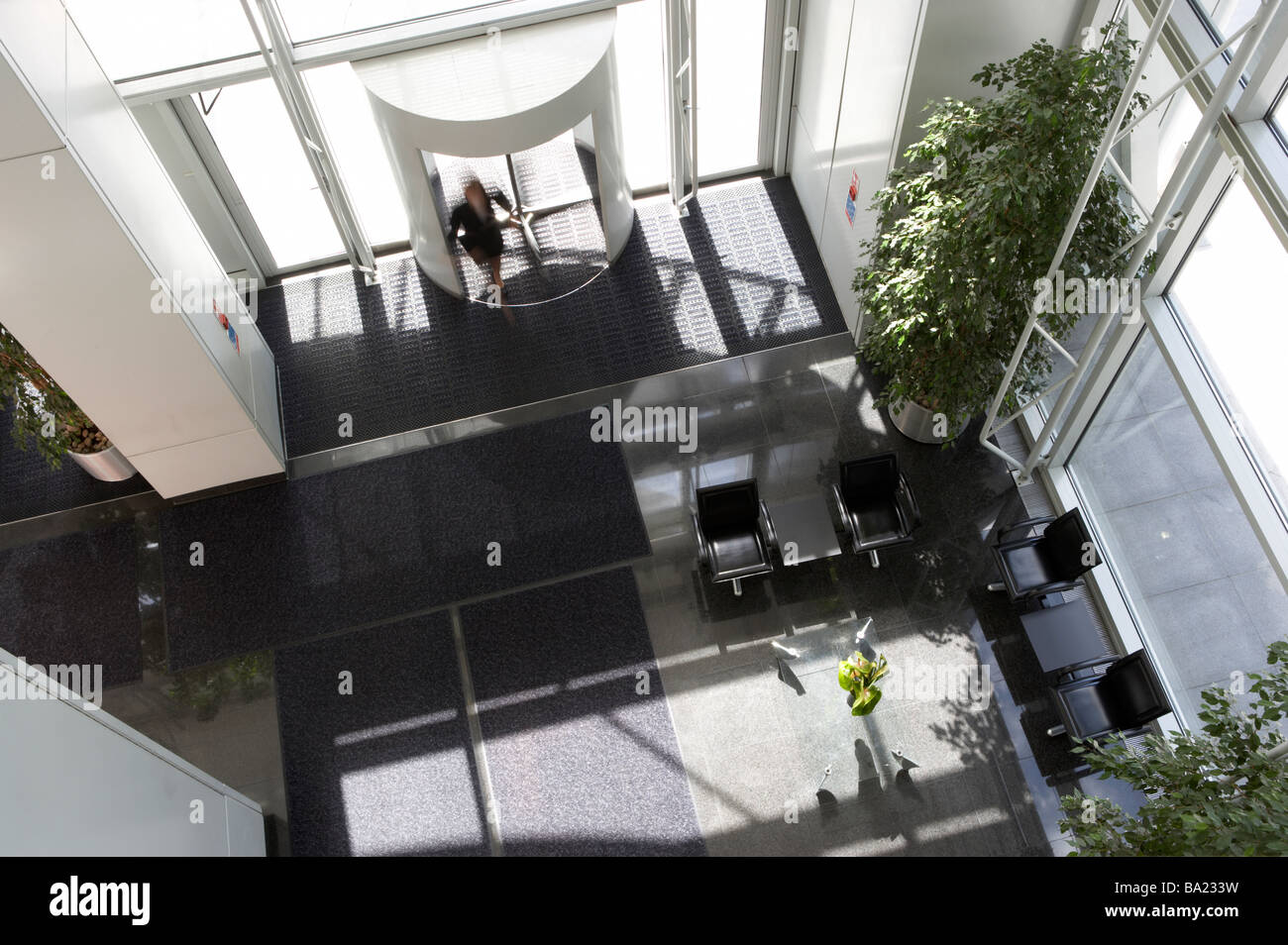 Woman walking office reception hi-res stock photography and images - Alamy