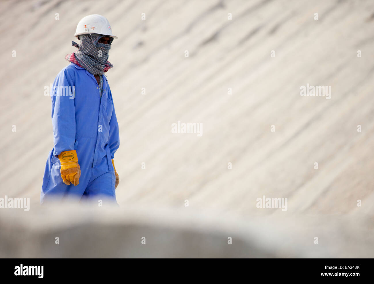 Arab workers working on a reclamation scheme to build another exclusive ...