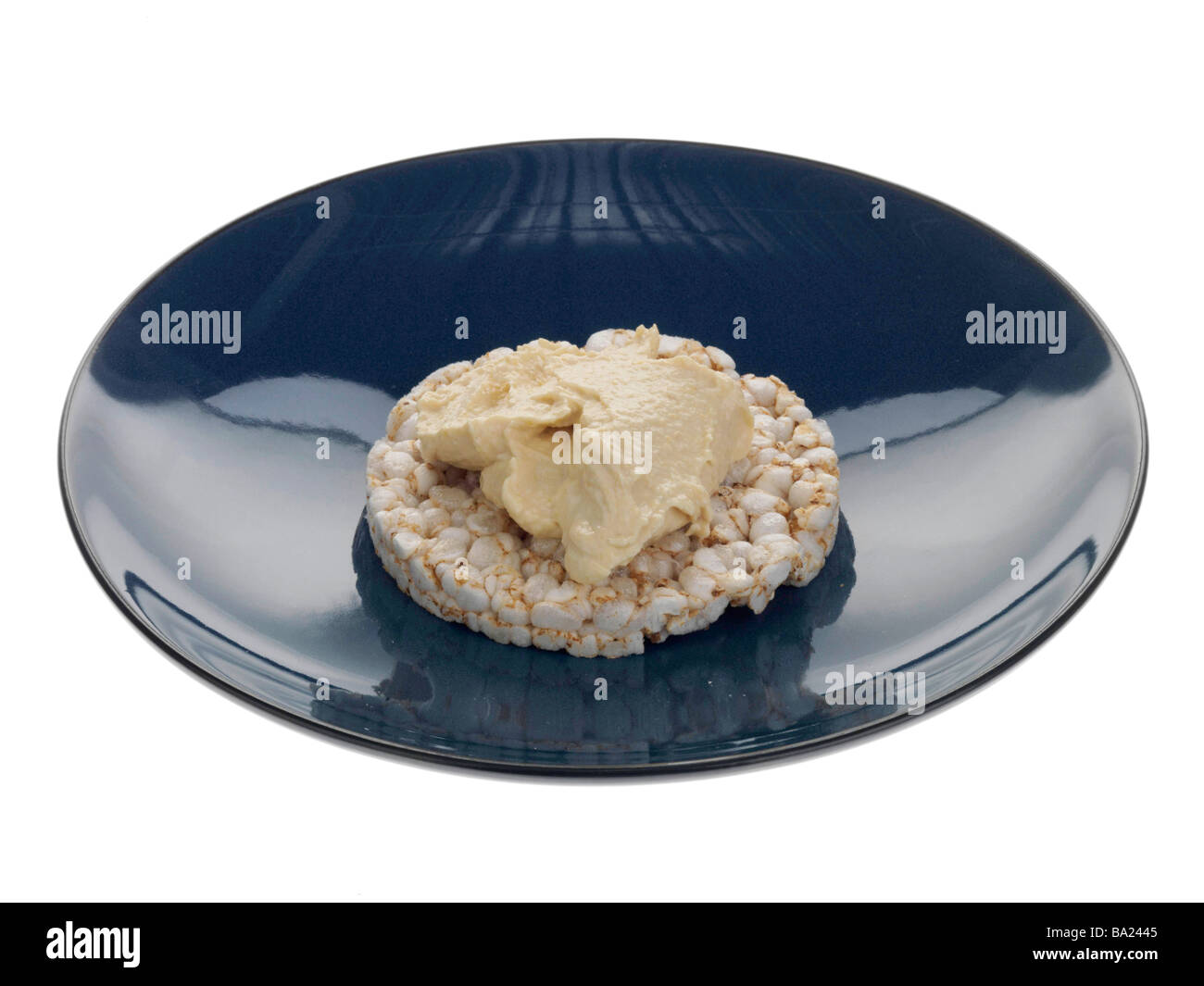 Rice Cake with Hummus Stock Photo - Alamy