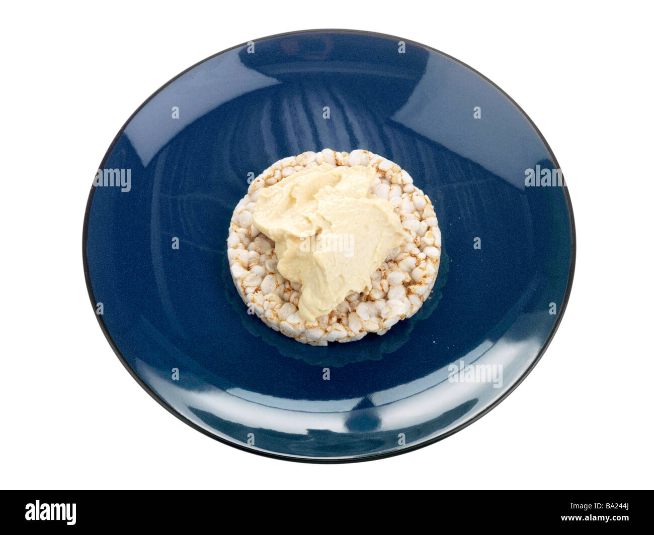 Rice Cake with Hummus Stock Photo - Alamy