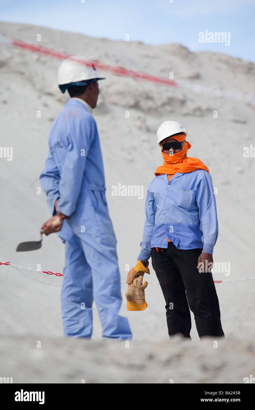 Arab workers working on a reclamation scheme to build another exclusive ...