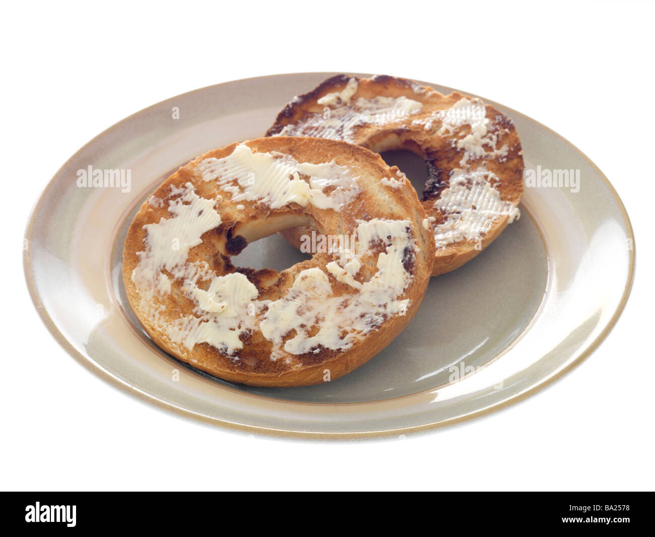 Toasted bagels butter on plate hi-res stock photography and images - Alamy