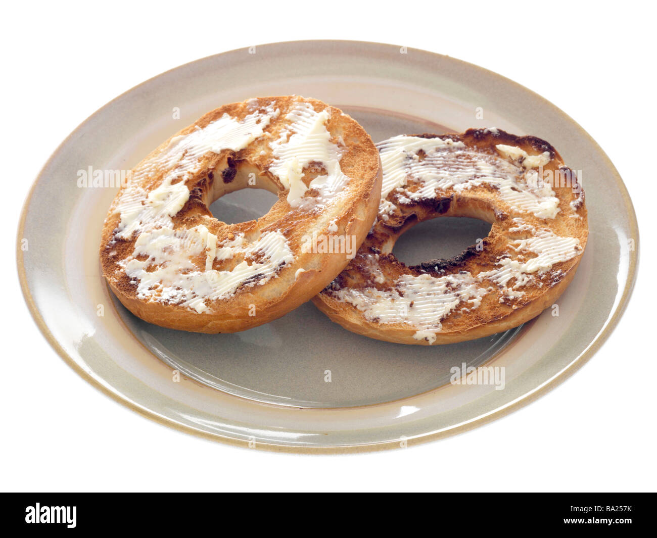 Toasted bagels butter on plate hi-res stock photography and images - Alamy