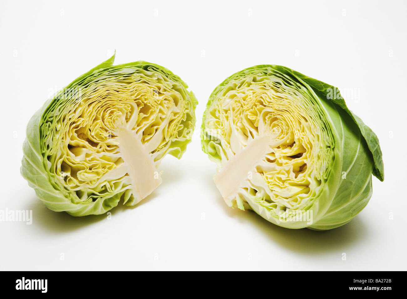 Cabbage Cut in Half on White Background Stock Photo - Alamy