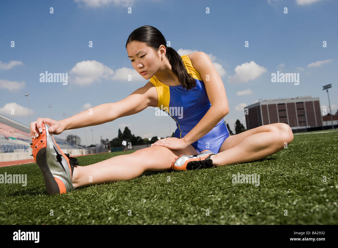 Female athlete stretching Stock Photo - Alamy
