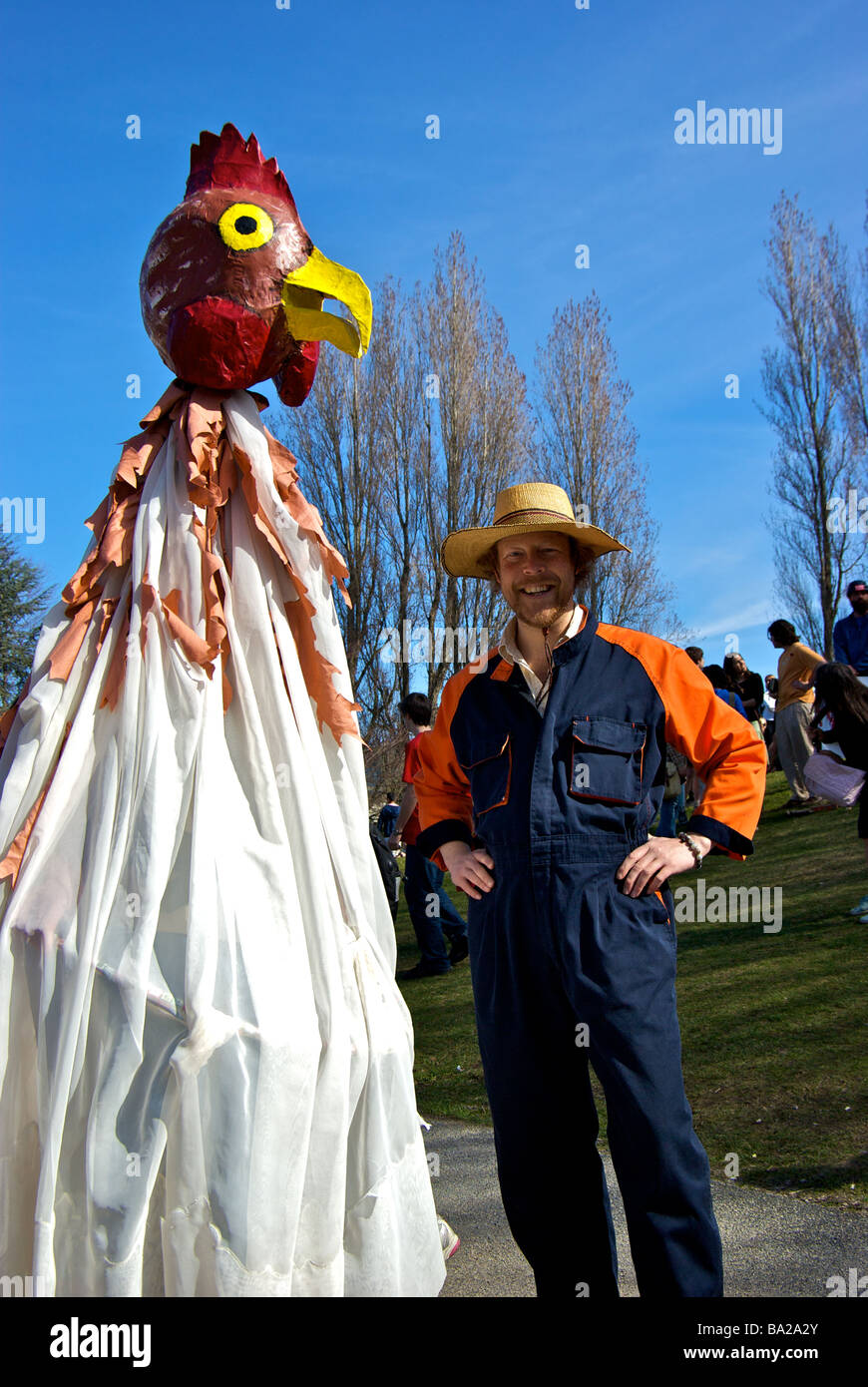 Protester wearing chicken costume and farmer attending the Save the ...