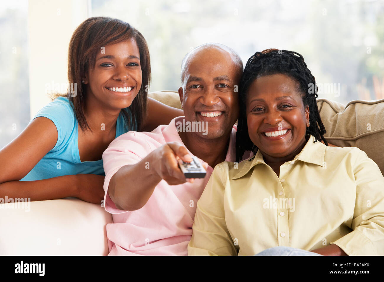 Family Watching Television Together Stock Photo - Alamy