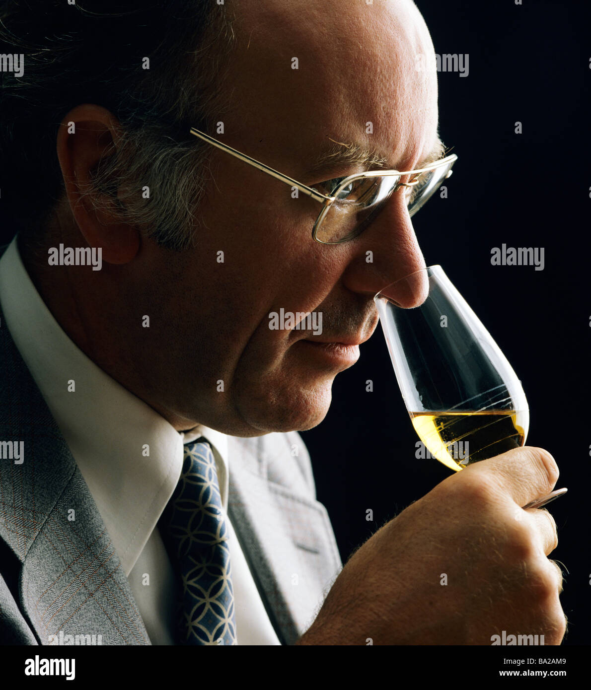 Master Blender blending or nosing whiskey at distillery Stock Photo - Alamy