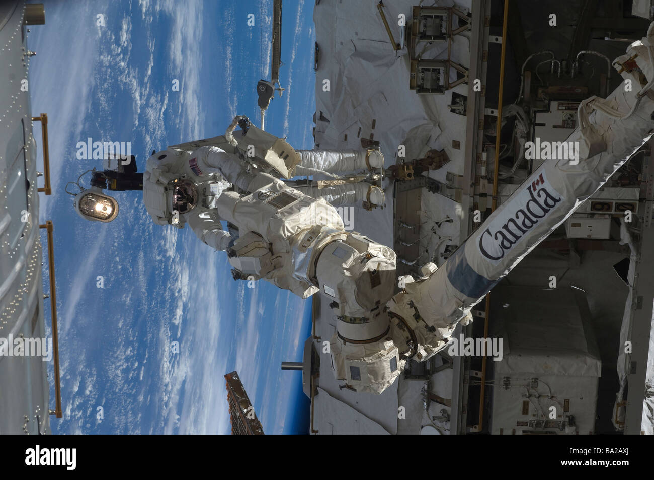 Astronaut participates in extravehicular activity Stock Photo - Alamy