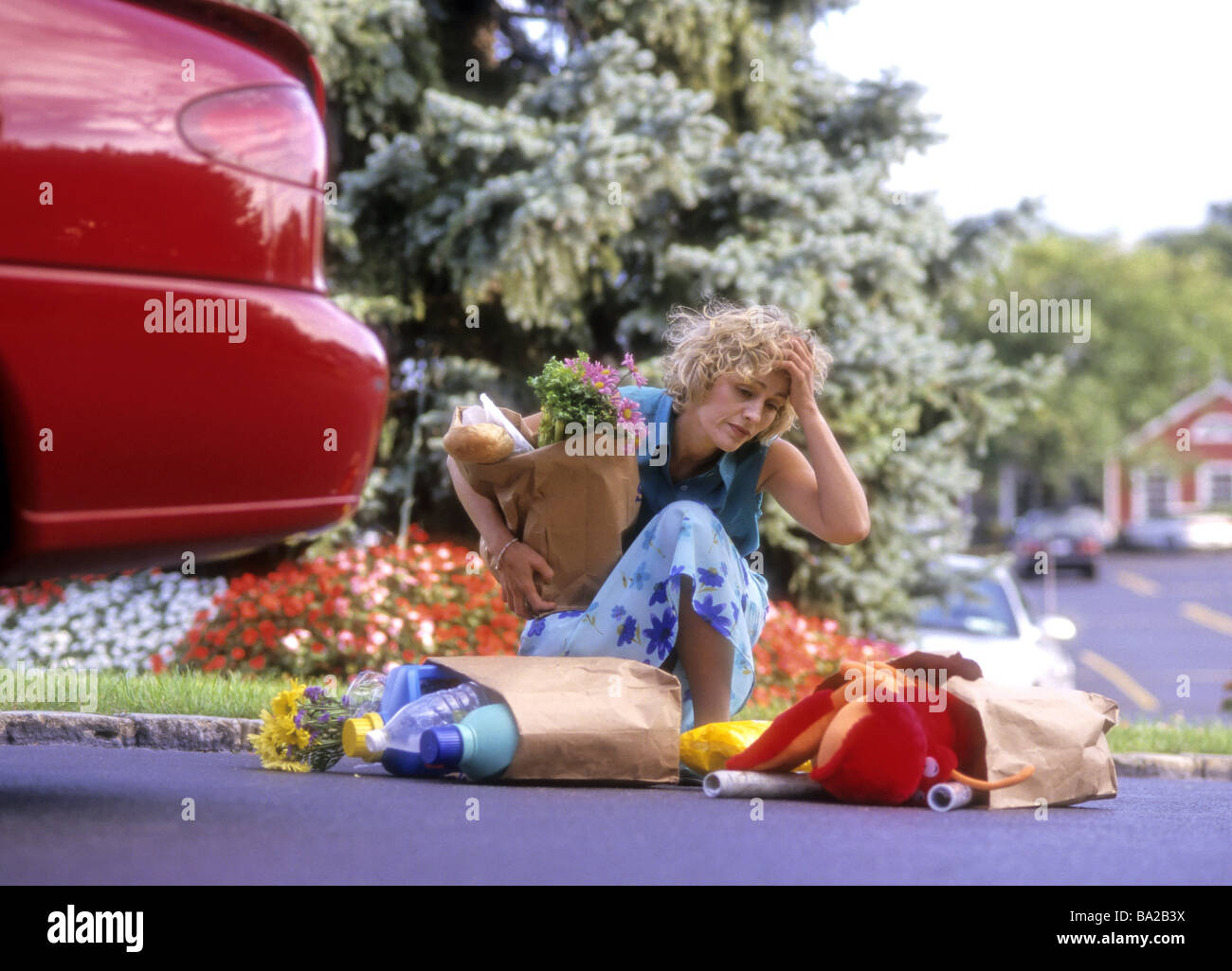 Dropped bag people hi-res stock photography and images - Alamy