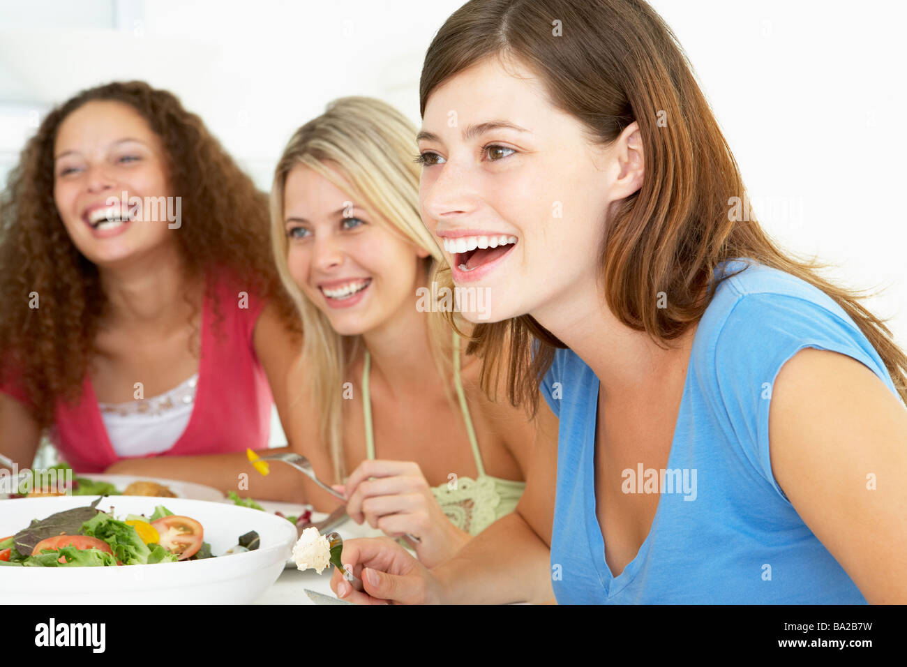 Friends Having Lunch Together At Home Stock Photo - Alamy