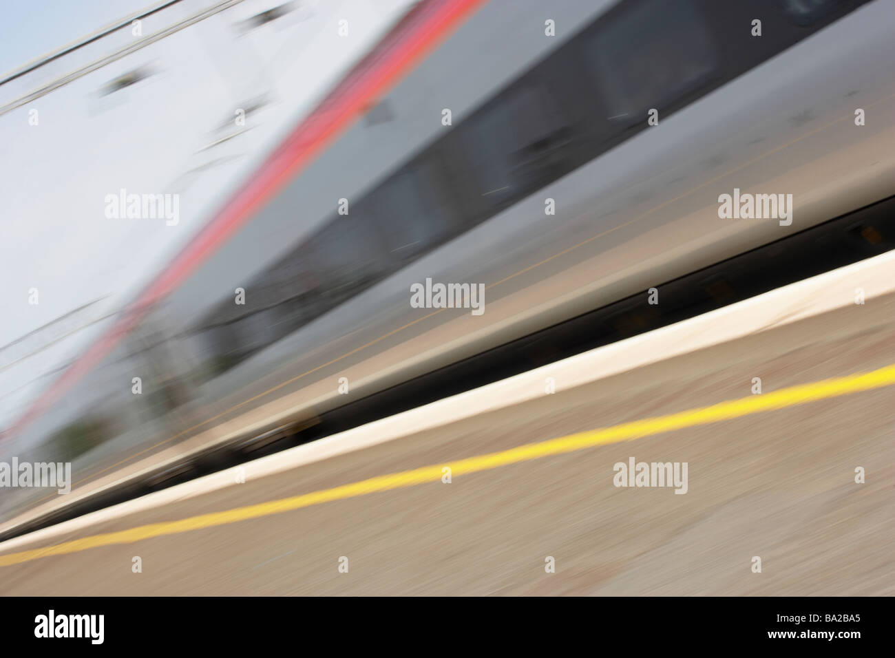 Train Travelling Past Platform Stock Photo - Alamy
