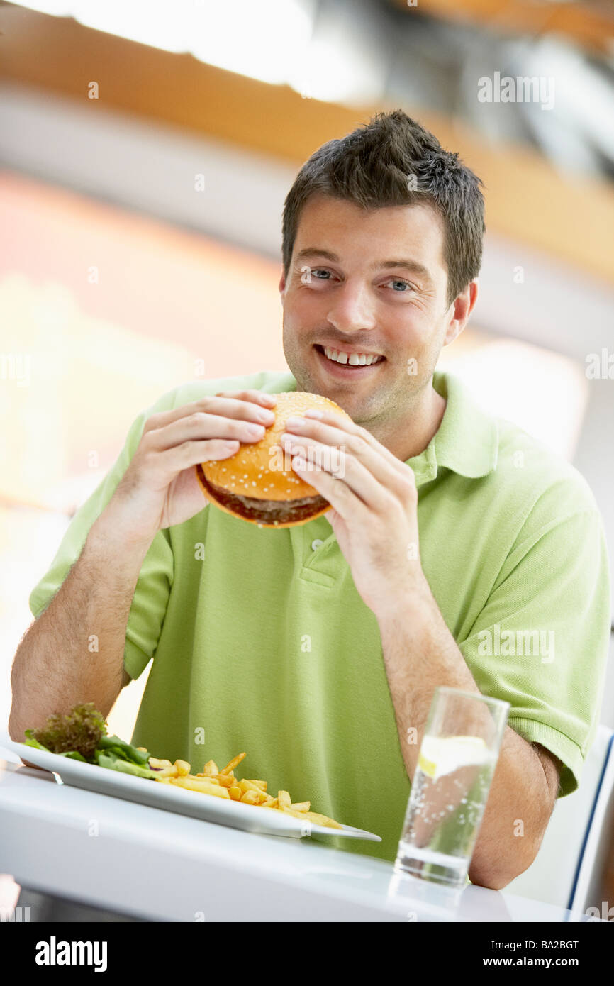 Man Eating Lunch At A Cafe Stock Photo - Alamy