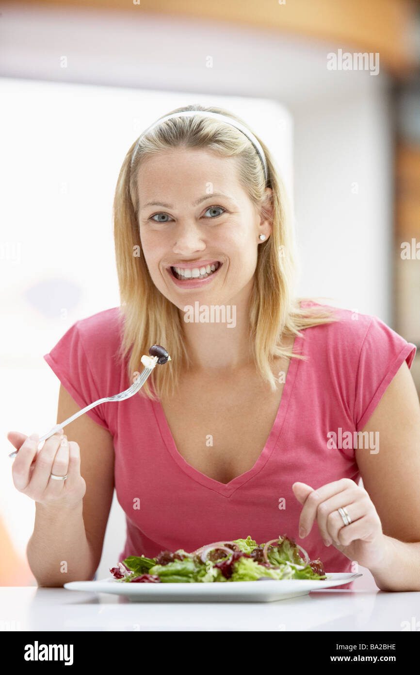 Woman Eating Lunch At A Cafe Stock Photo - Alamy