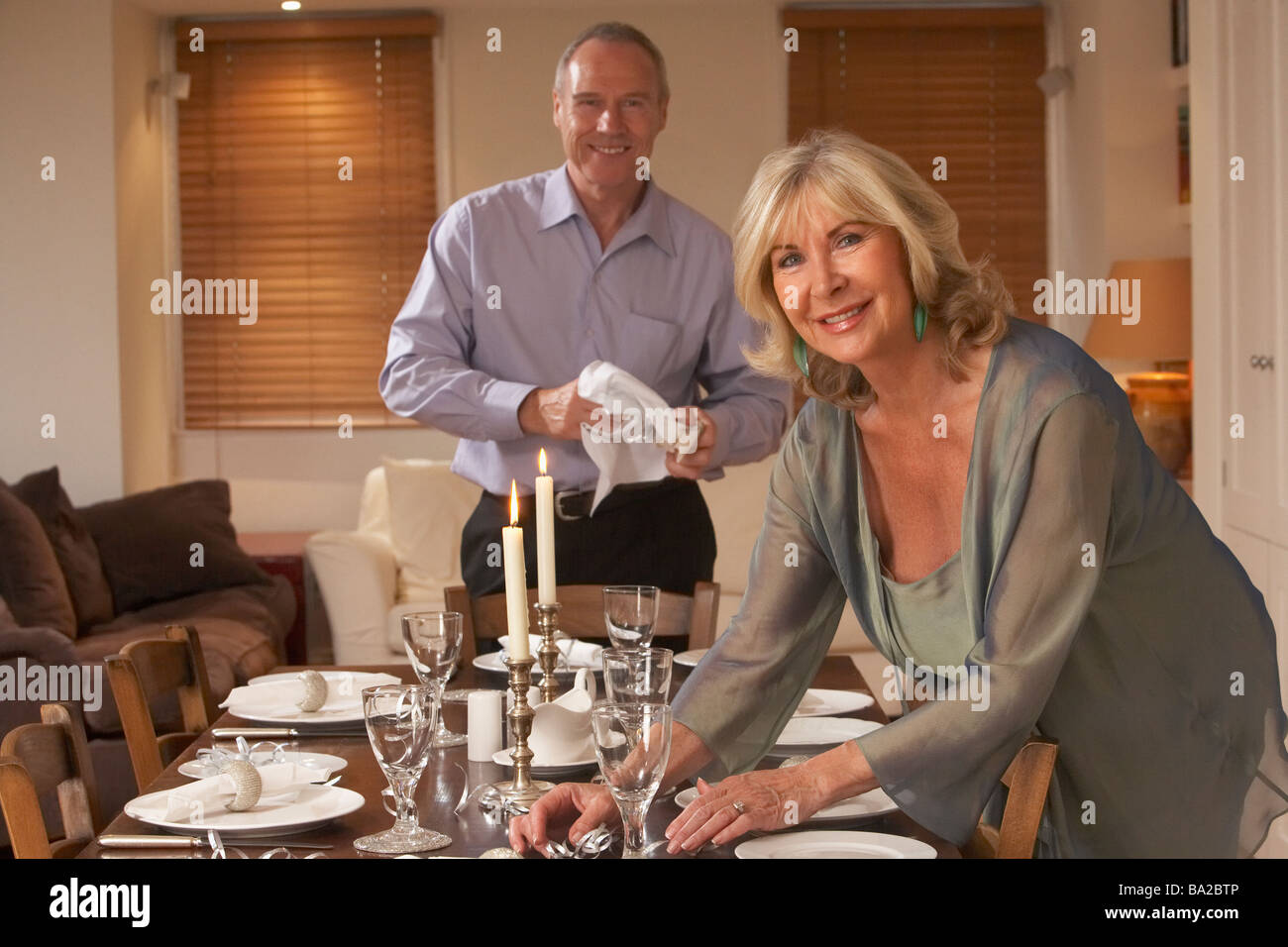 Preparing dinner party hi-res stock photography and images - Alamy