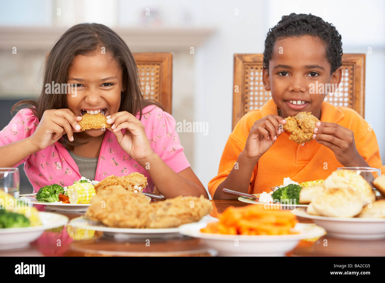 Brother And Sister Having Lunch Together At Home Stock Photo - Alamy