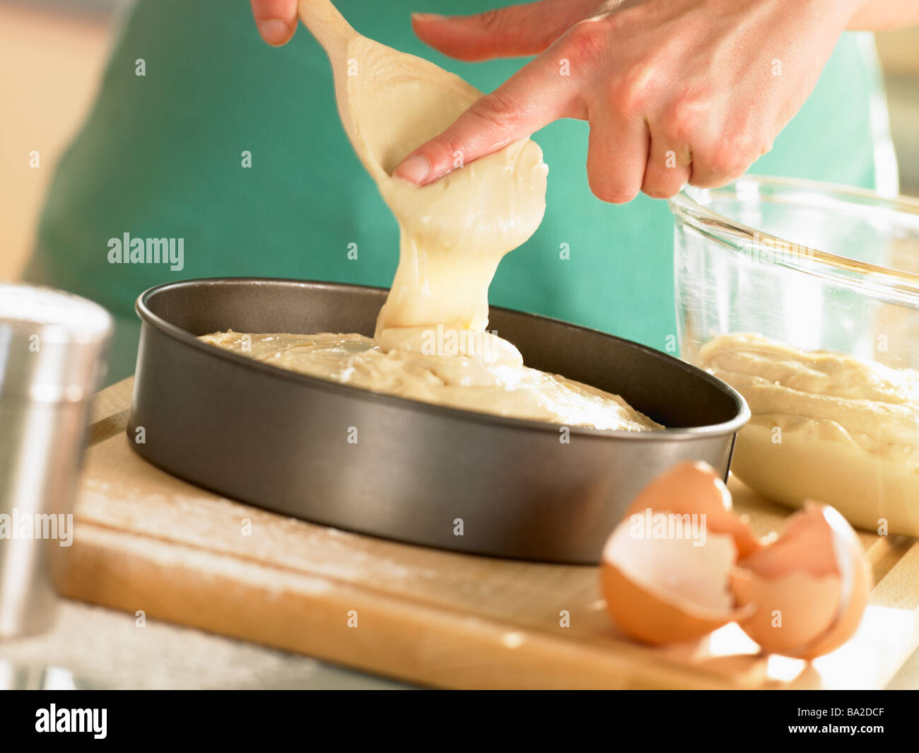 Pouring Cake Mixture Into Baking Tin Stock Photo - Alamy