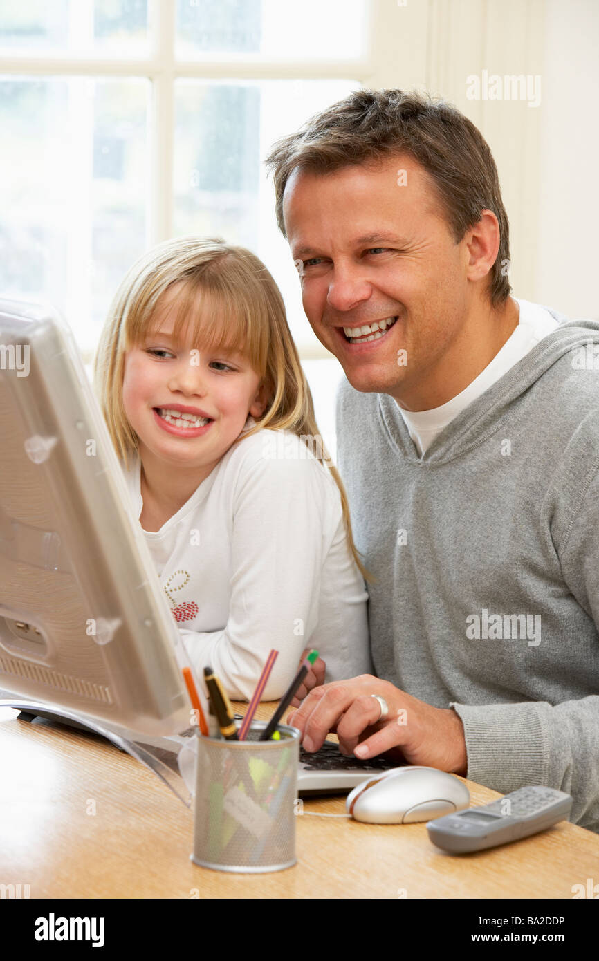 Father And Daughter Using Computer Stock Photo - Alamy