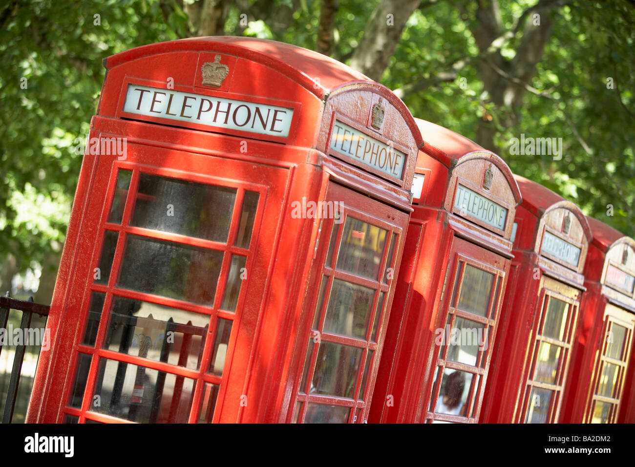 Red Telephone Booths In A Row Stock Photo - Alamy