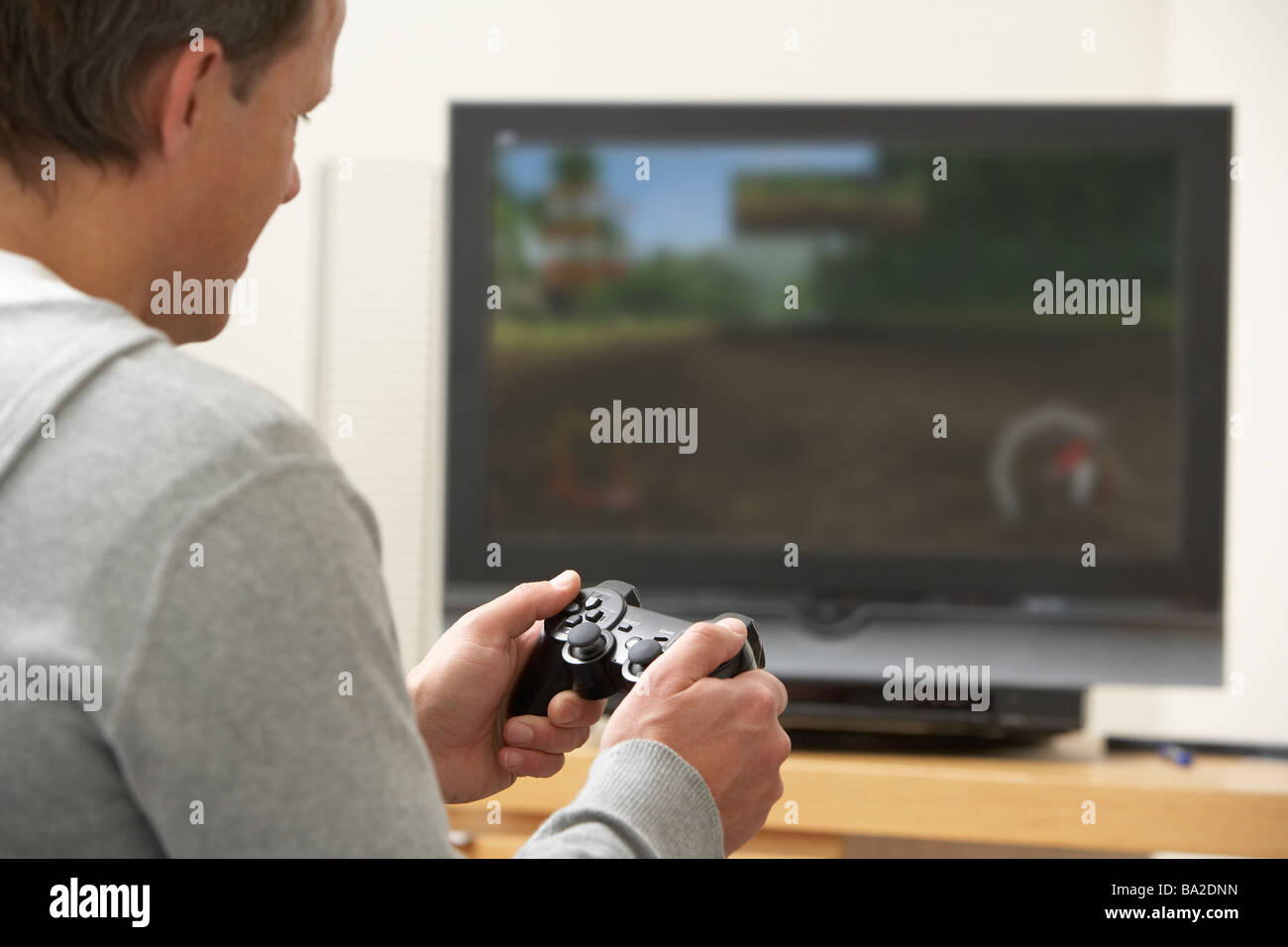 Man Playing With Game Console Stock Photo - Alamy