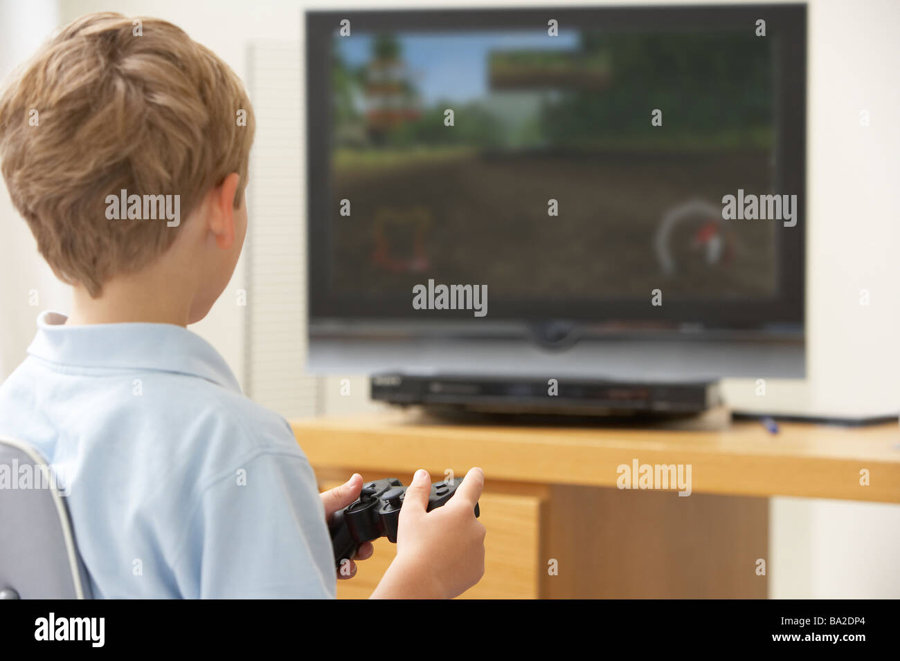 Child playing game console hi-res stock photography and images - Alamy