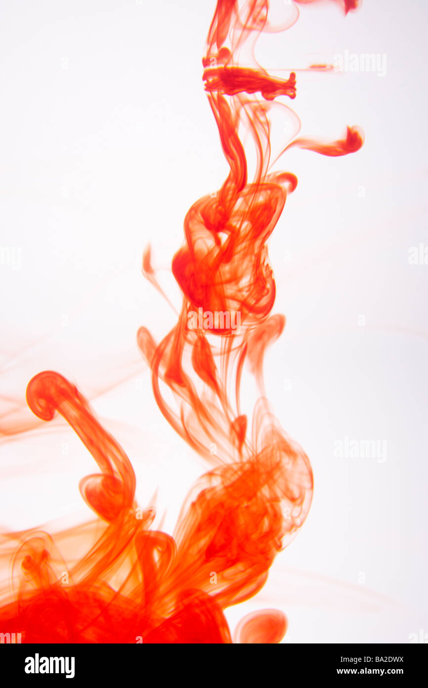 Red Ink Mixing With Water Stock Photo - Alamy