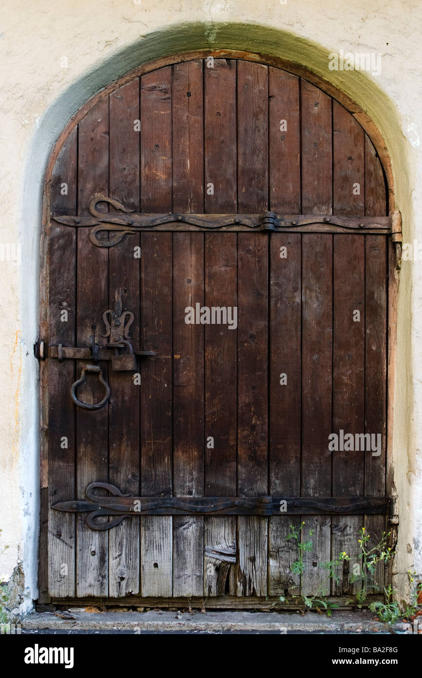 Old medieval arched door Stock Photo - Alamy
