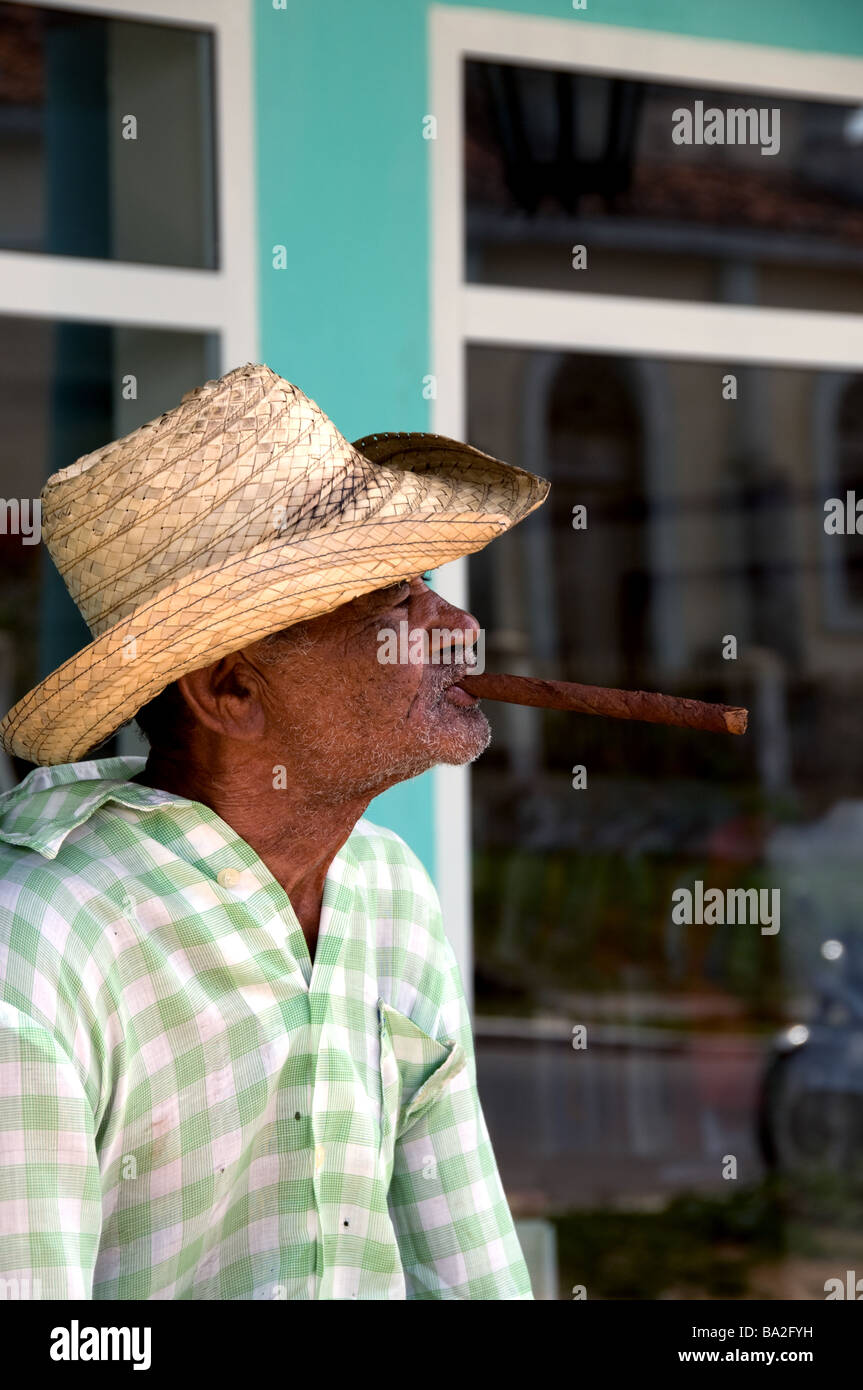 Old Cuban man smoking large cigar Stock Photo - Alamy