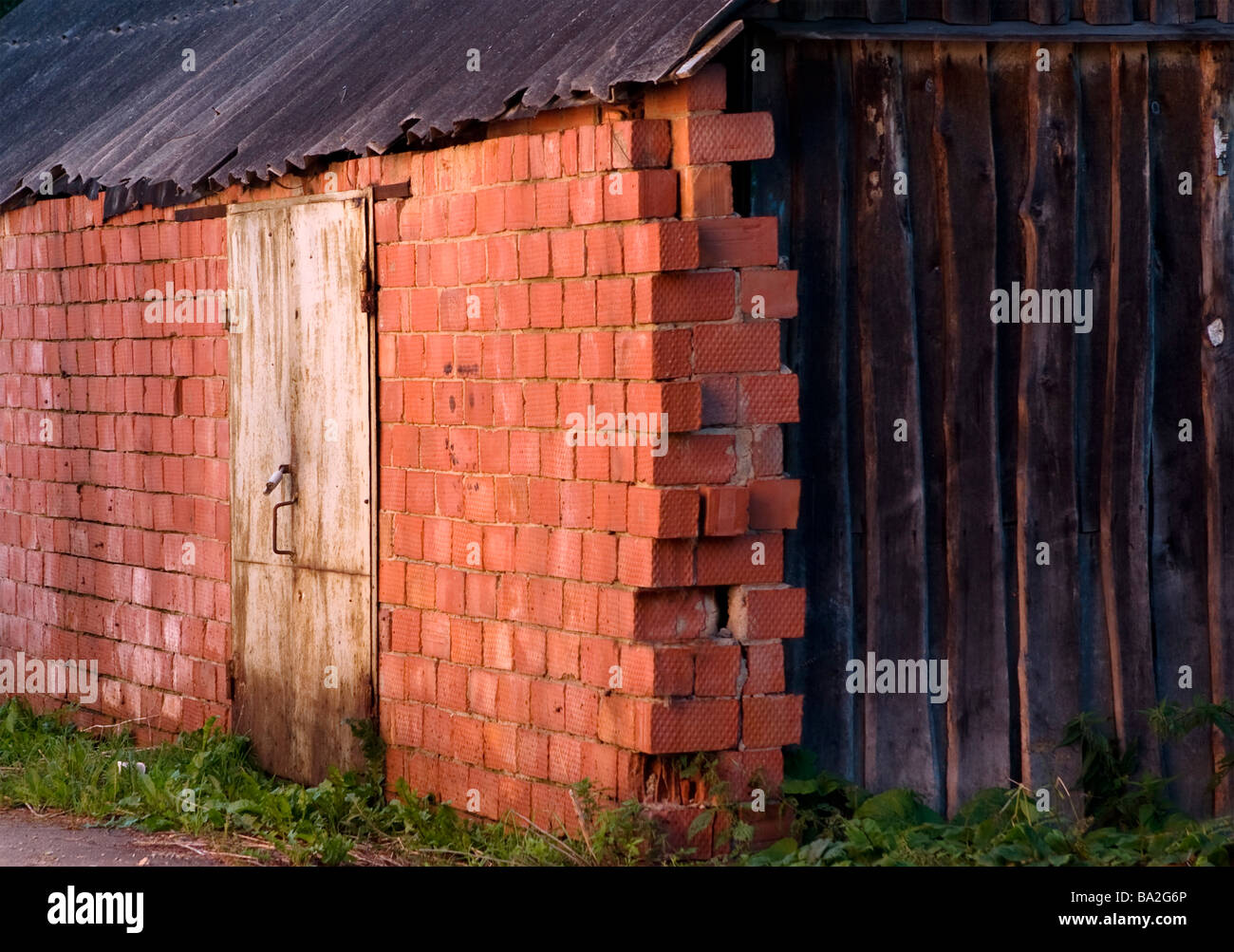 Brick wooden storehouse Stock Photo - Alamy