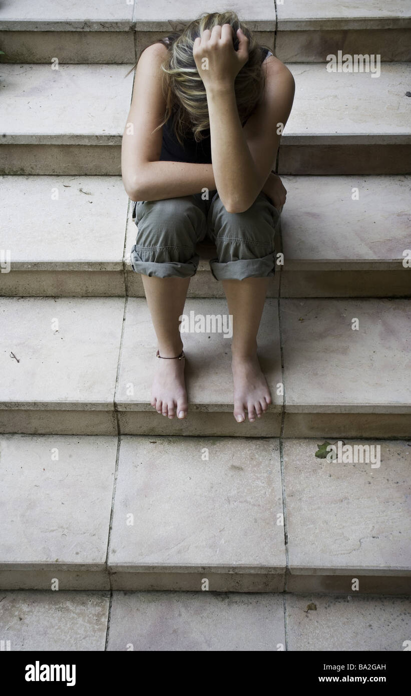 Girls crouched together hi-res stock photography and images - Alamy