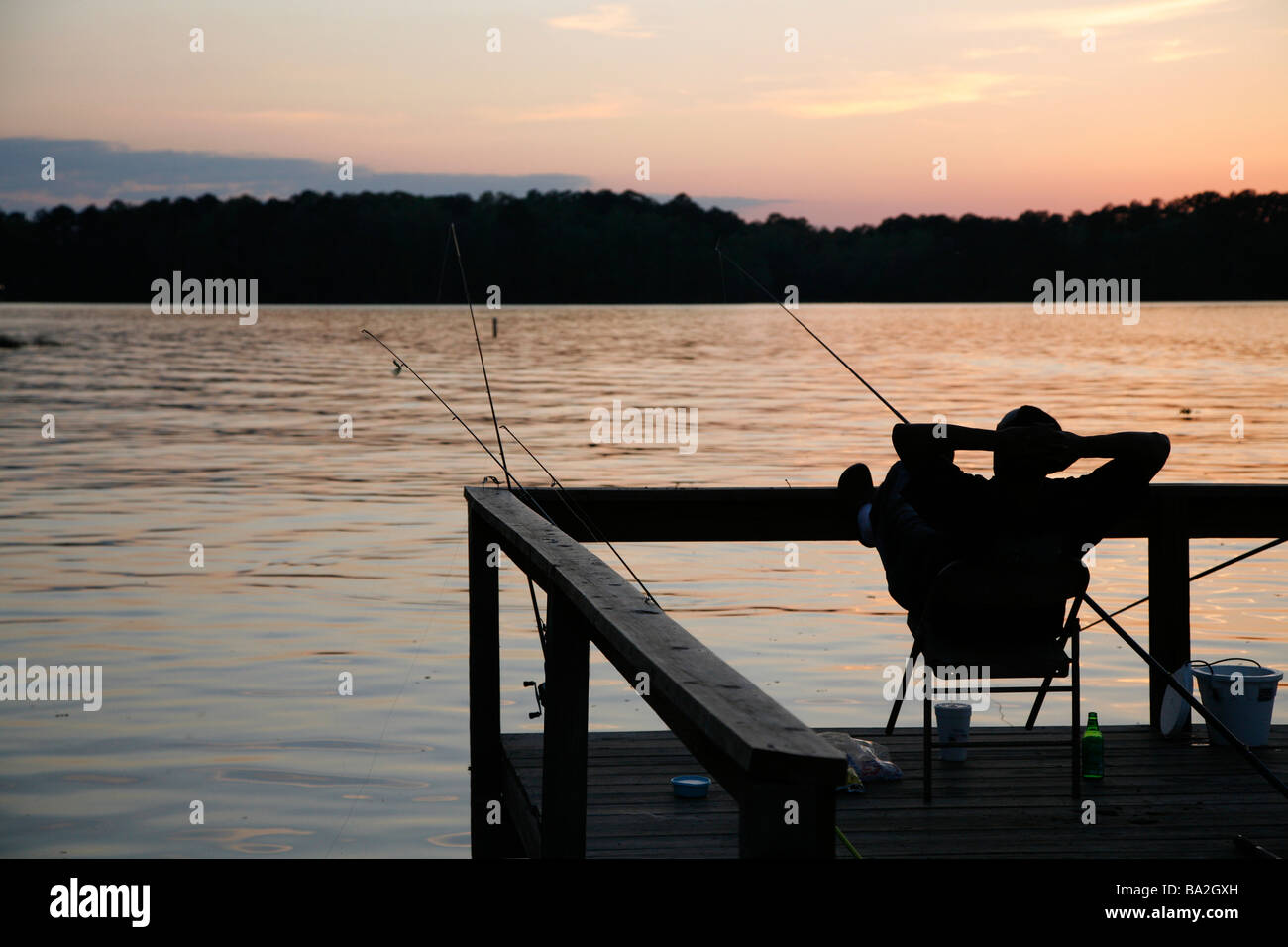 Seated and fishing hi-res stock photography and images - Alamy