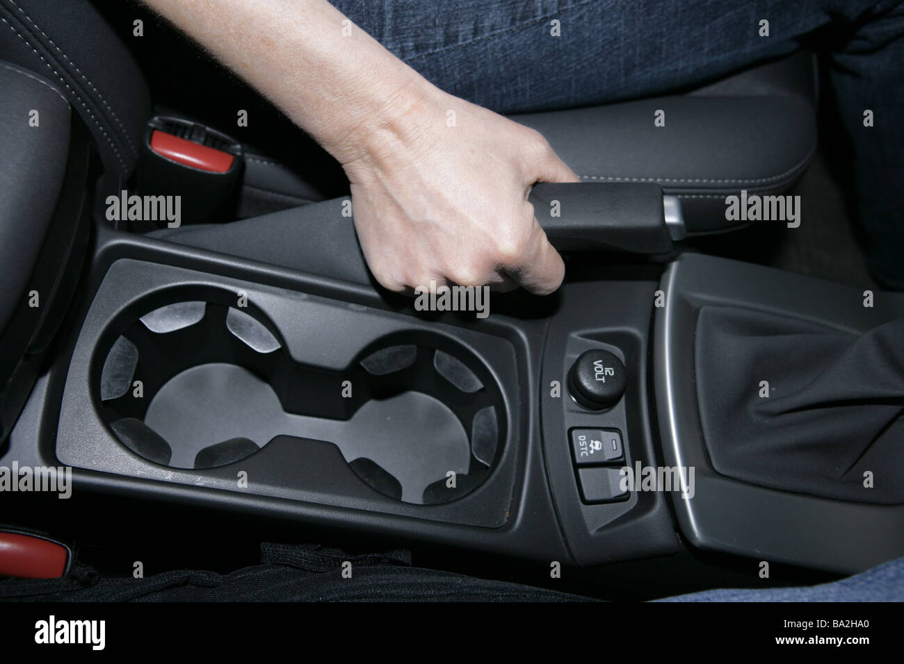 Motorist gesture hand brake moves detail woman car drives danger danger ...