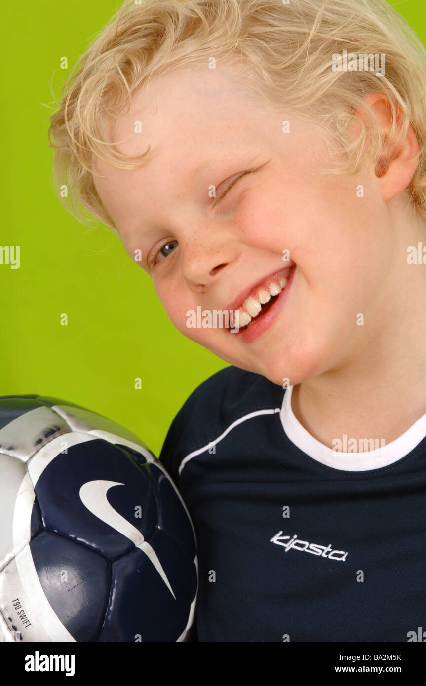 Give birth smiles wink football portrait broached no property release ...