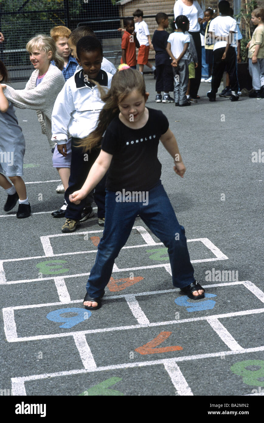 Girl playing hopscotch in hi-res stock photography and images - Alamy