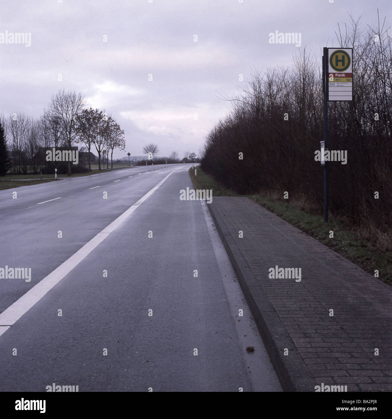 Country road bus stop sign "panic" street wideness distance human-empty ...