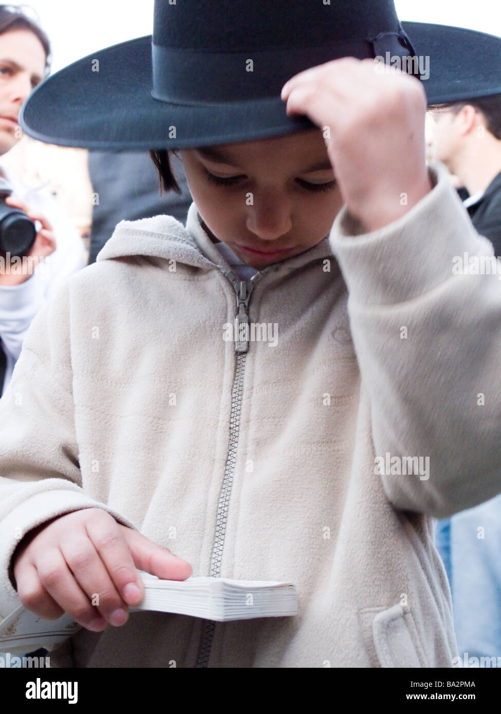Young Boy praying at The Blessing of the Sun at The Wailing Wall in ...