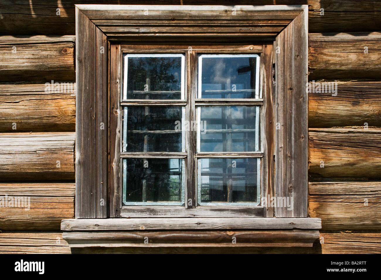 Russian traditional log house wall details with window Stock Photo - Alamy