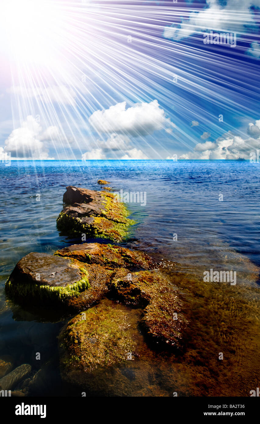 Blue sky over water Stock Photo - Alamy