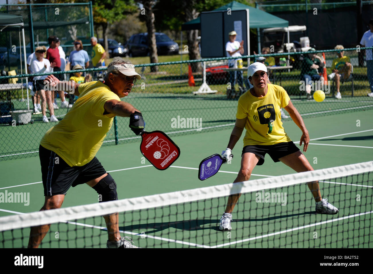 Senior citizens compete in game of Pickleball in the Senior state ...