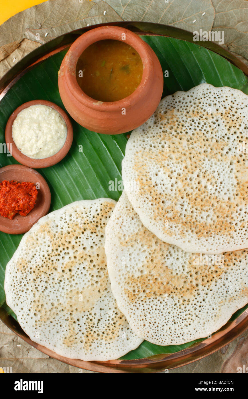 Set dosa is a set of 3dosas topped with butter or ghee and served with ...