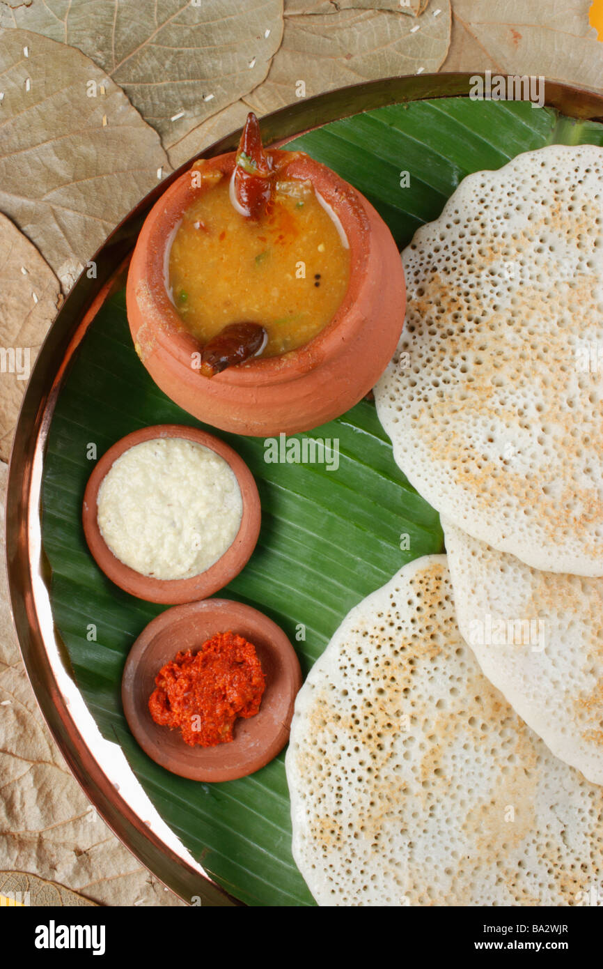 Set dosa is a set of 3dosas topped with butter or ghee and served with ...