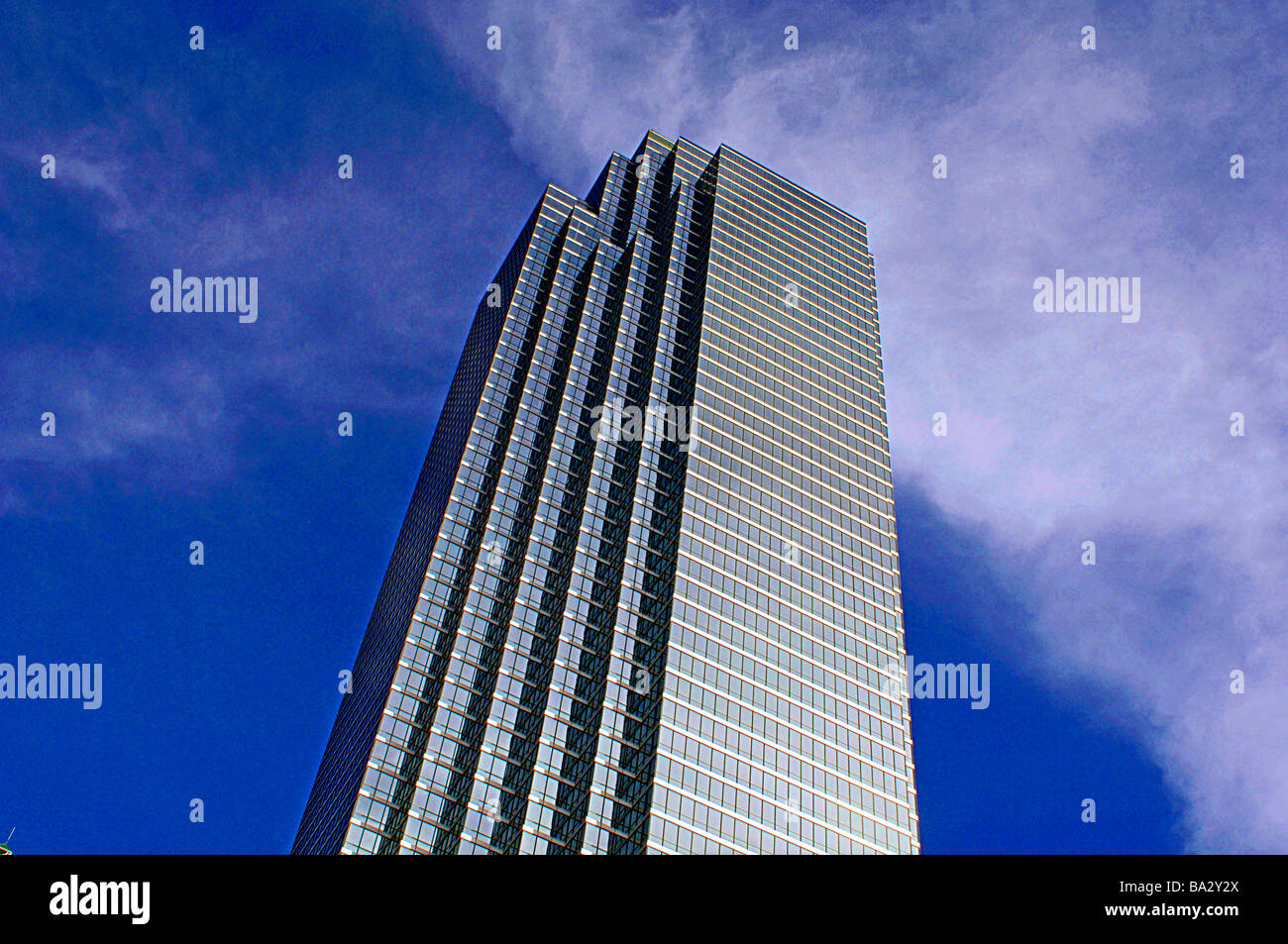 Towering modern glass skyscraper in an urban city Stock Photo - Alamy