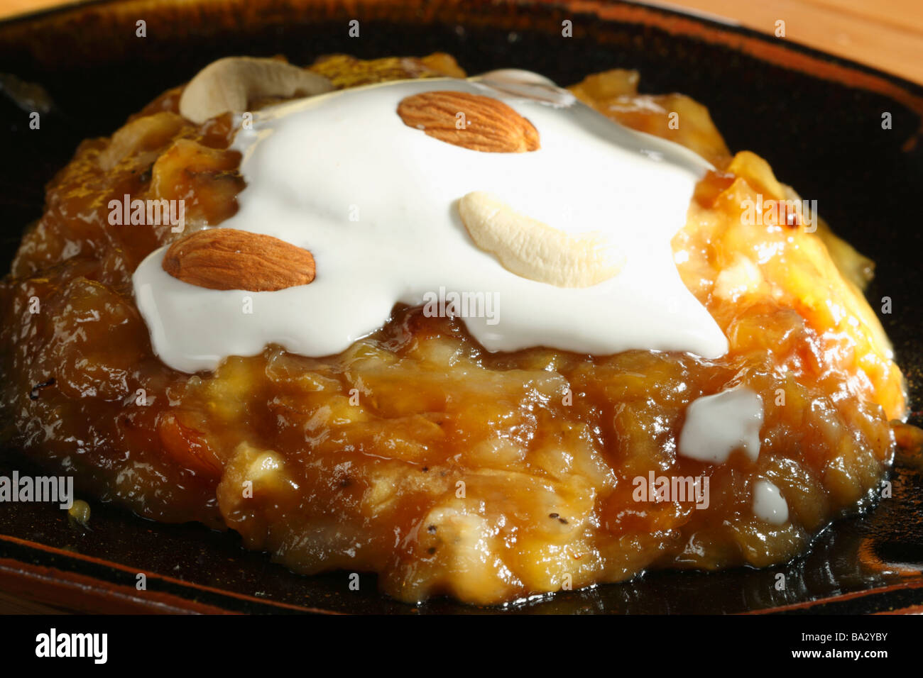 Moz ka Meetha is a banana sweet dish from hyderabadi cuisine Stock ...