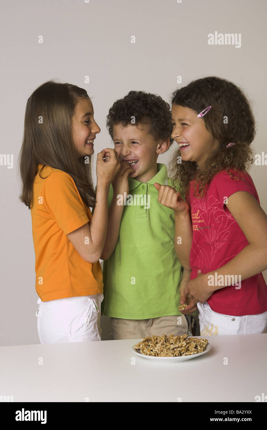 Give birth girls laughs walnut-halves eats stands series people ...